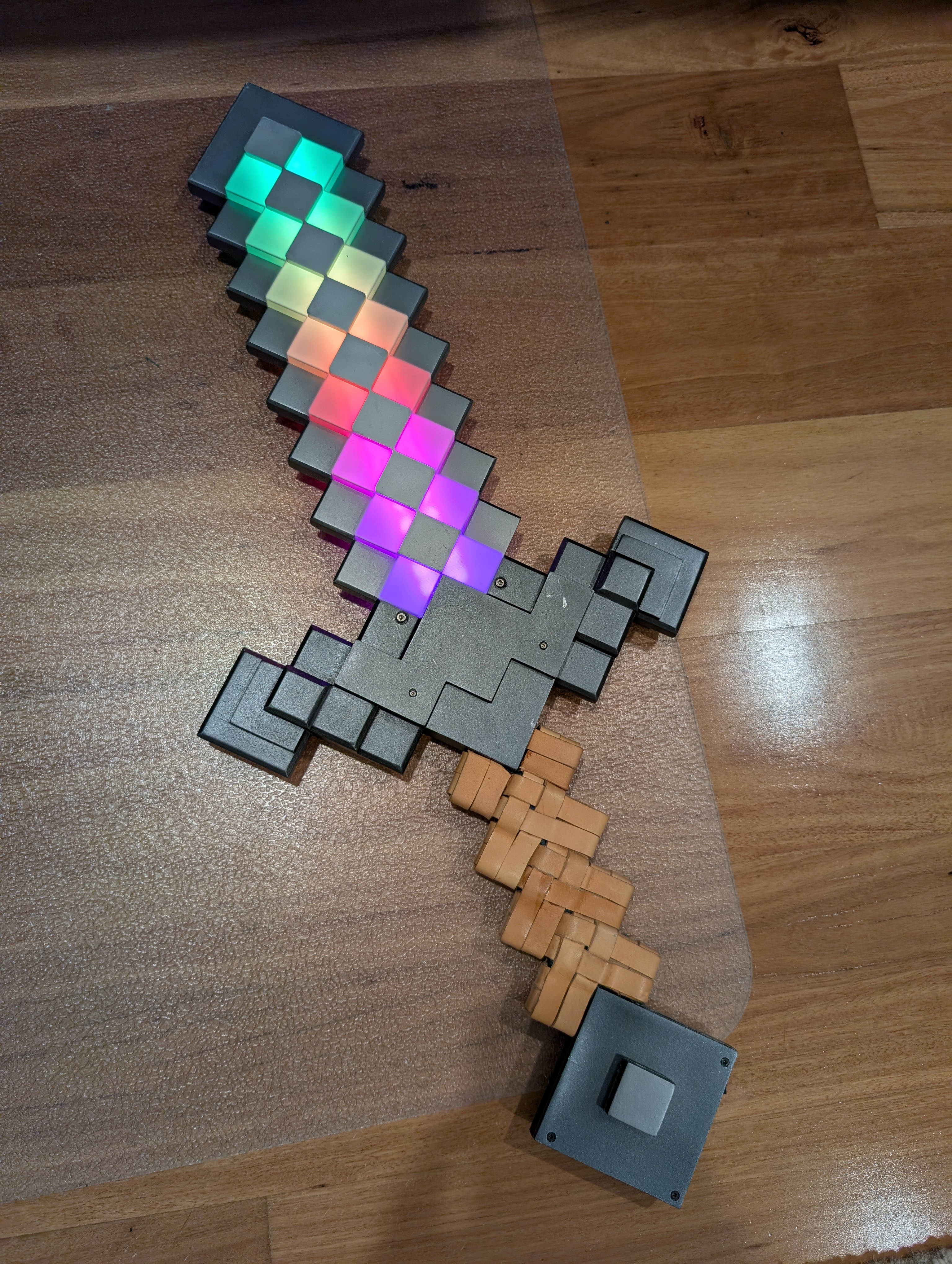 Life-Size Minecraft Diamond Sword with Motion-Reactive LED Lighting ...